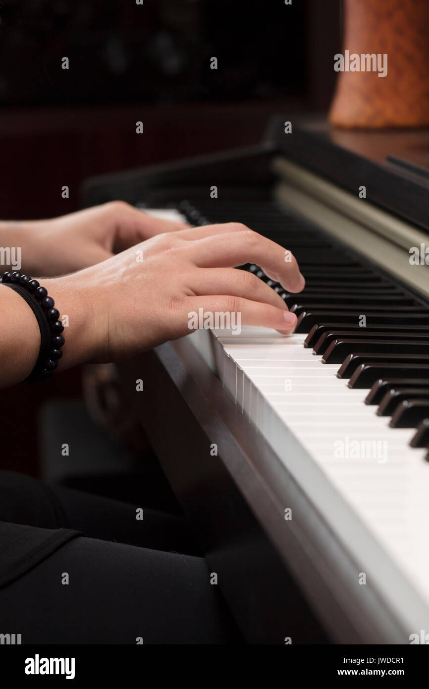 Person playing the piano hi-res stock photography and images - Alamy