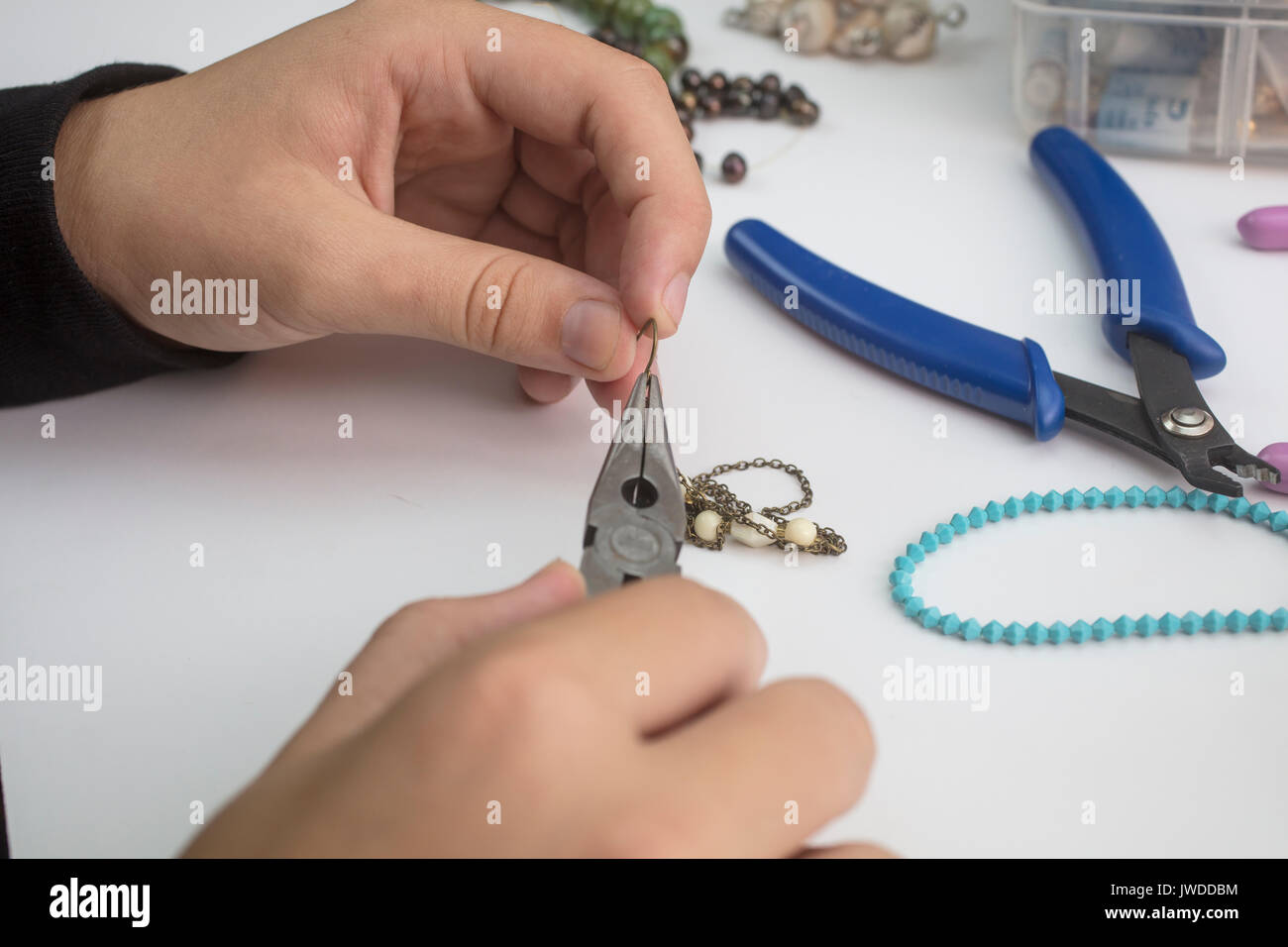 Hand beading hi-res stock photography and images - Alamy