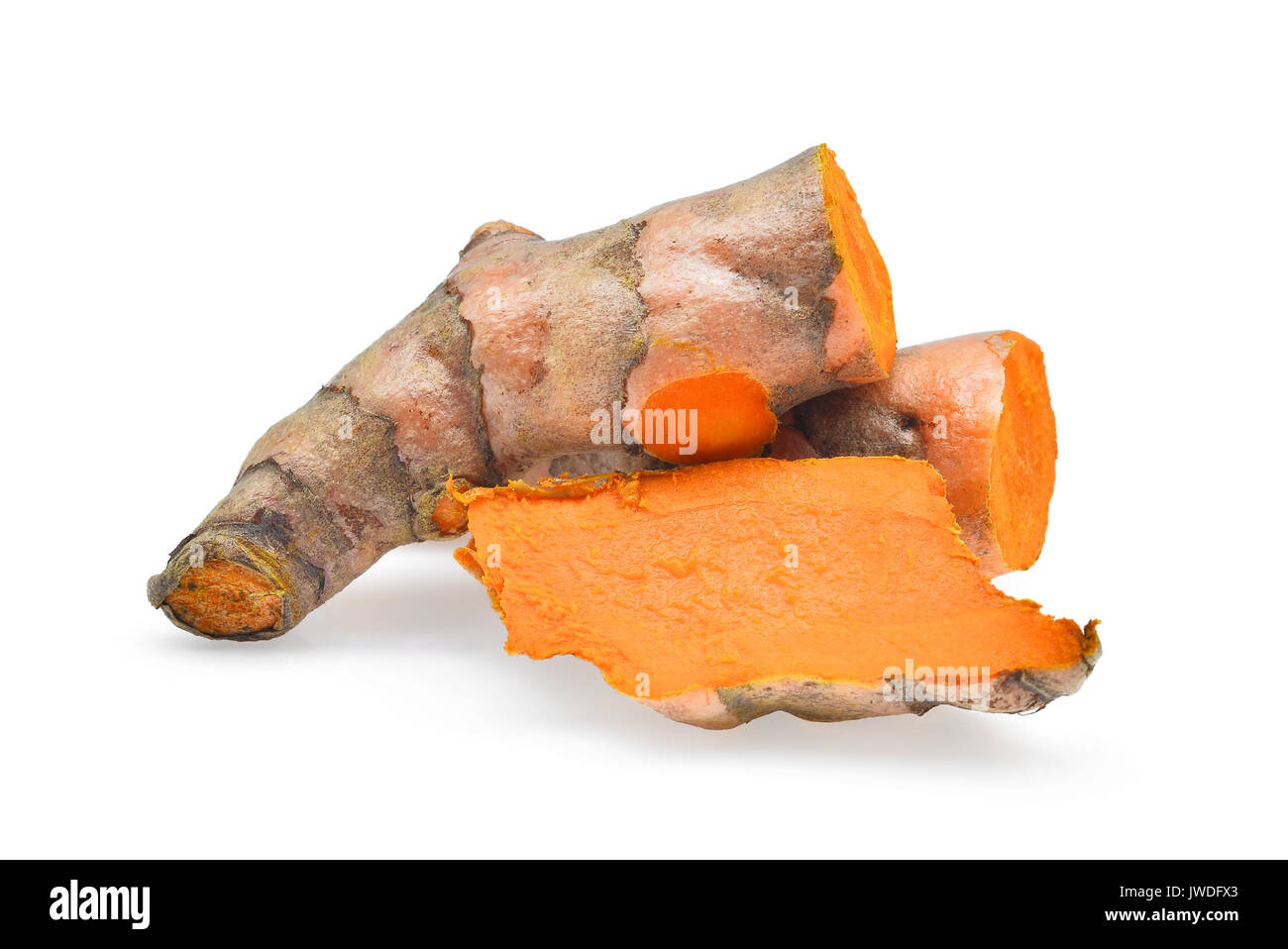 turmeric root isolated on white background Stock Photo - Alamy