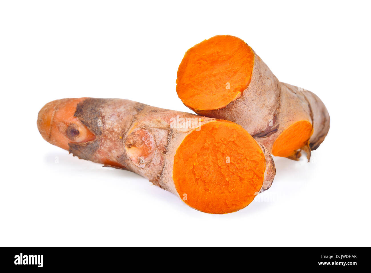 turmeric root isolated on white background Stock Photo - Alamy