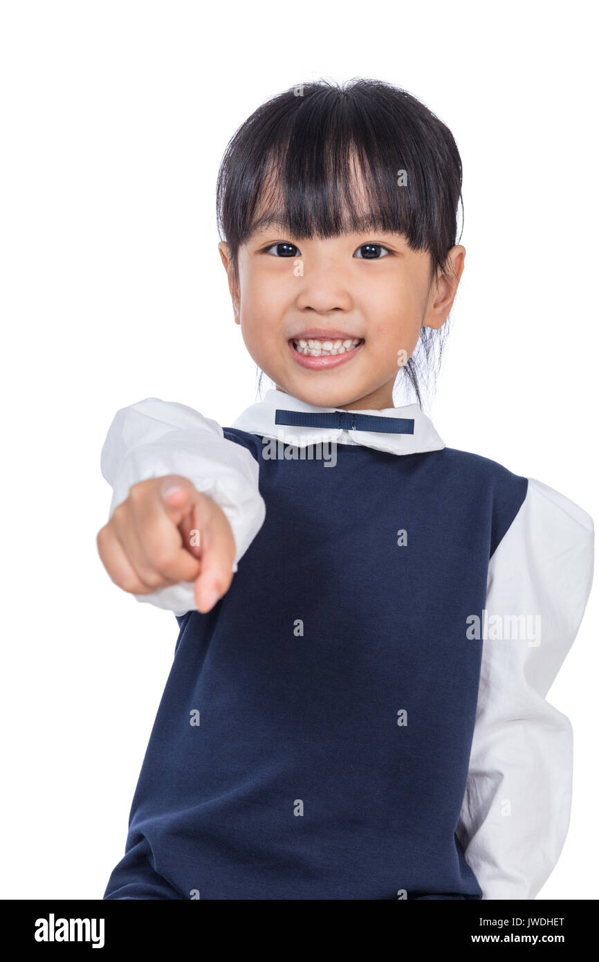 Asian Little Chinese Girl pointing with finger in isolated White ...