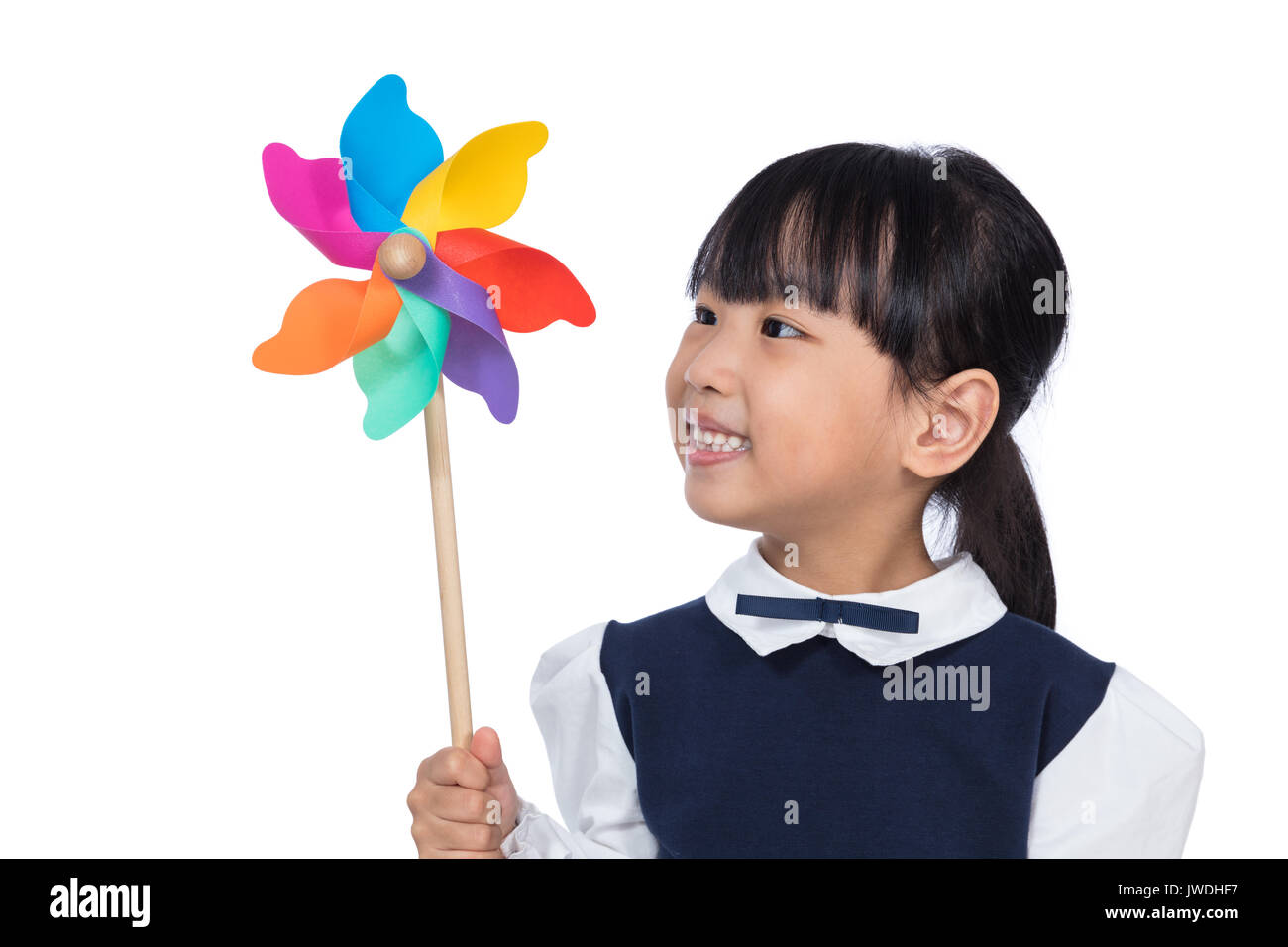 Asian Little Chinese Girl Playing Colorful Pinwheel in isolated White ...