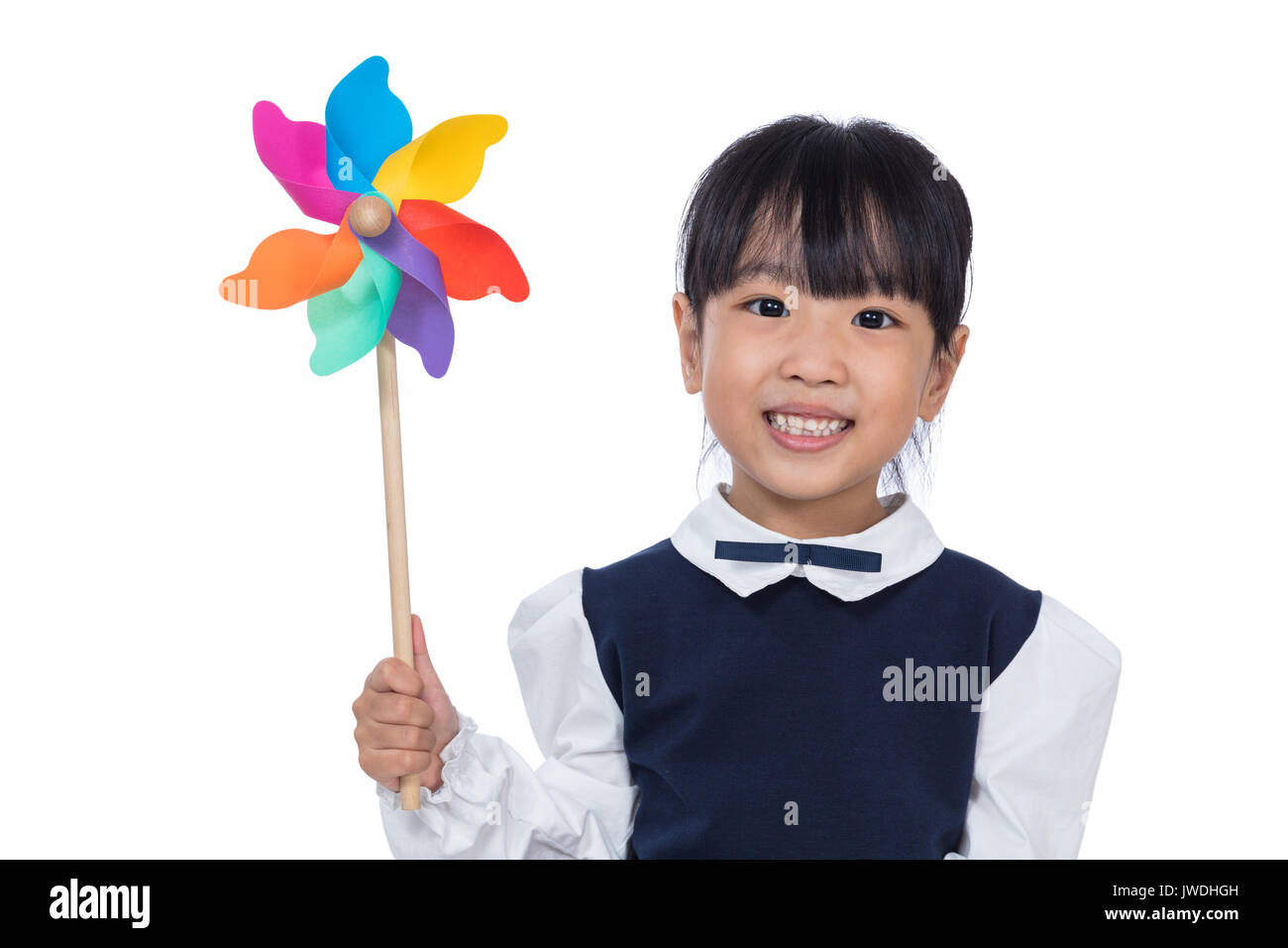 Asian Little Chinese Girl Playing Colorful Pinwheel in isolated White ...