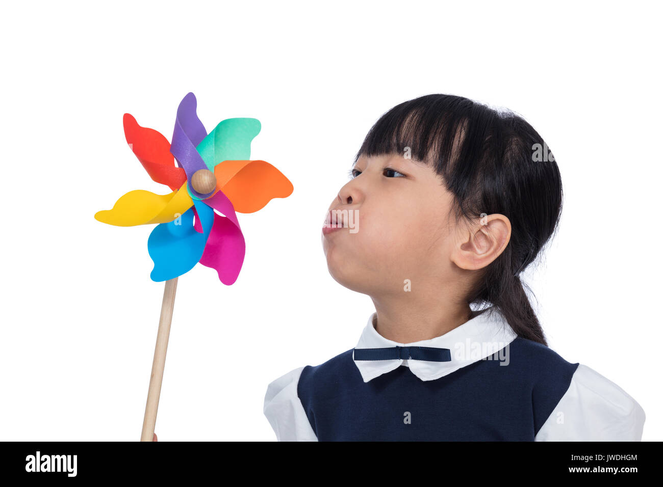 Asian Little Chinese Girl Playing Colorful Pinwheel in isolated White ...