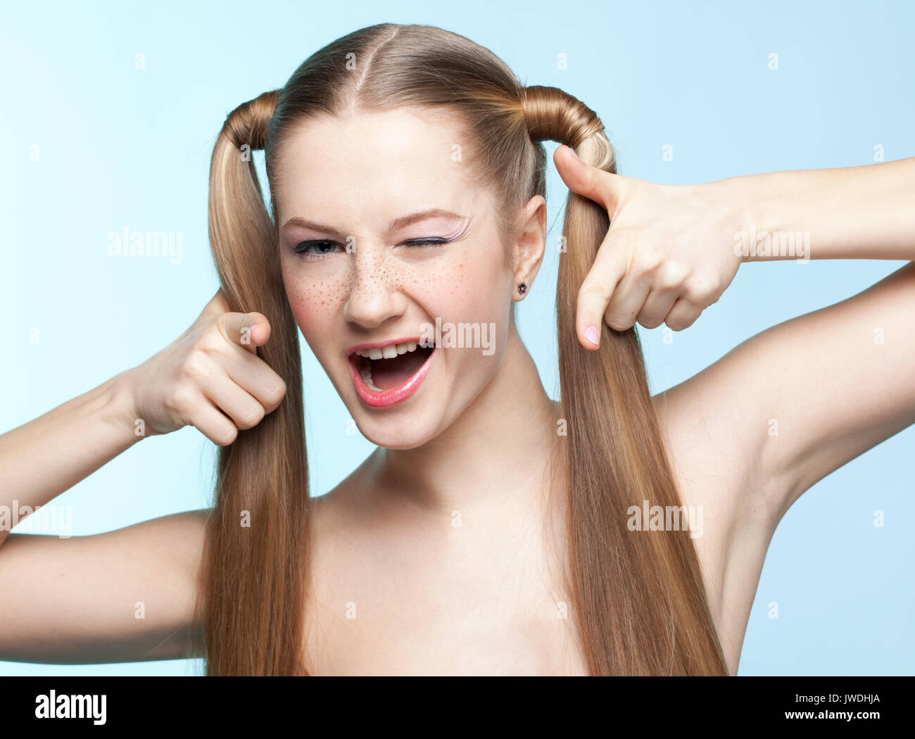 Playful freckled girl hi-res stock photography and images - Alamy