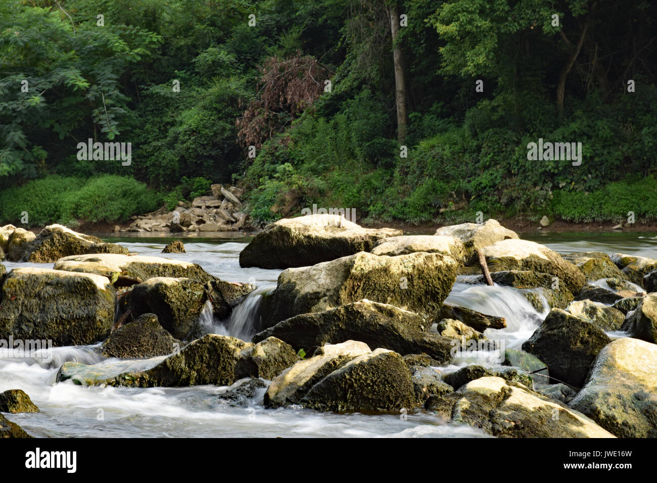 River Flowing Over Rocks Stock Photo - Alamy