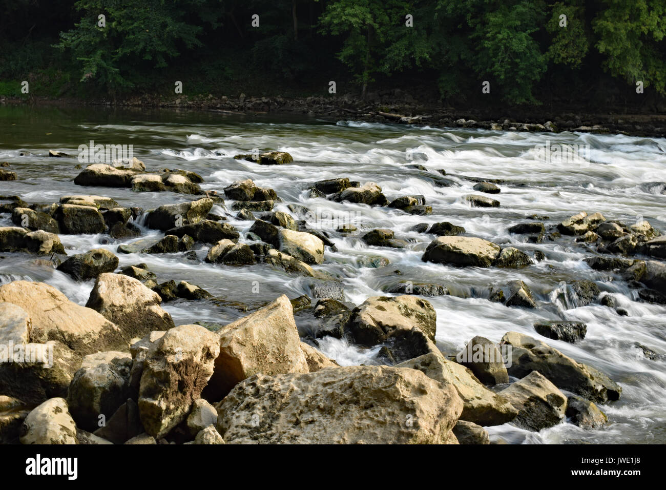 River Flowing Over Rocks Stock Photo - Alamy