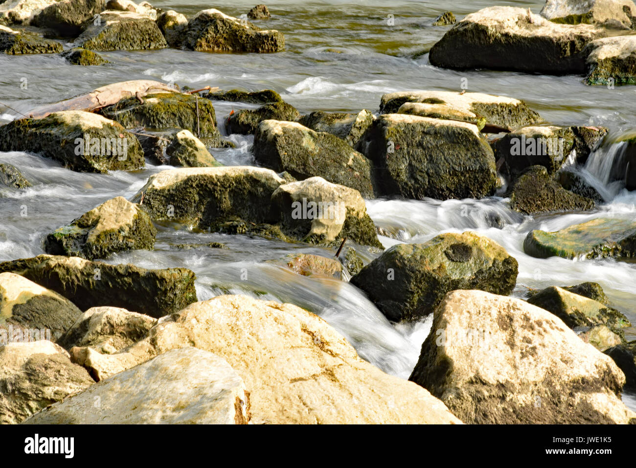 River Flowing Over Rocks Stock Photo - Alamy