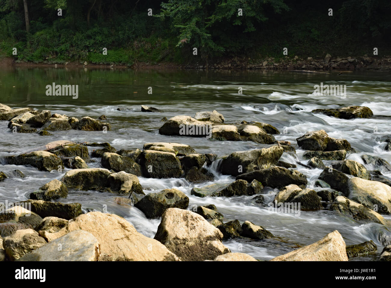 River Flowing Over Rocks Stock Photo - Alamy