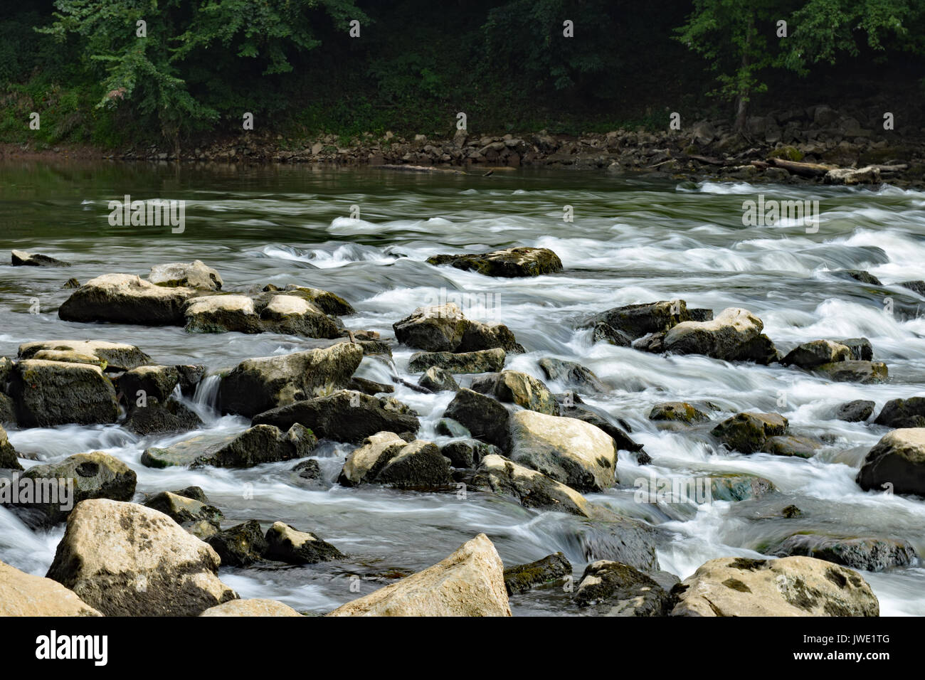 River Flowing Over Rocks Stock Photo - Alamy