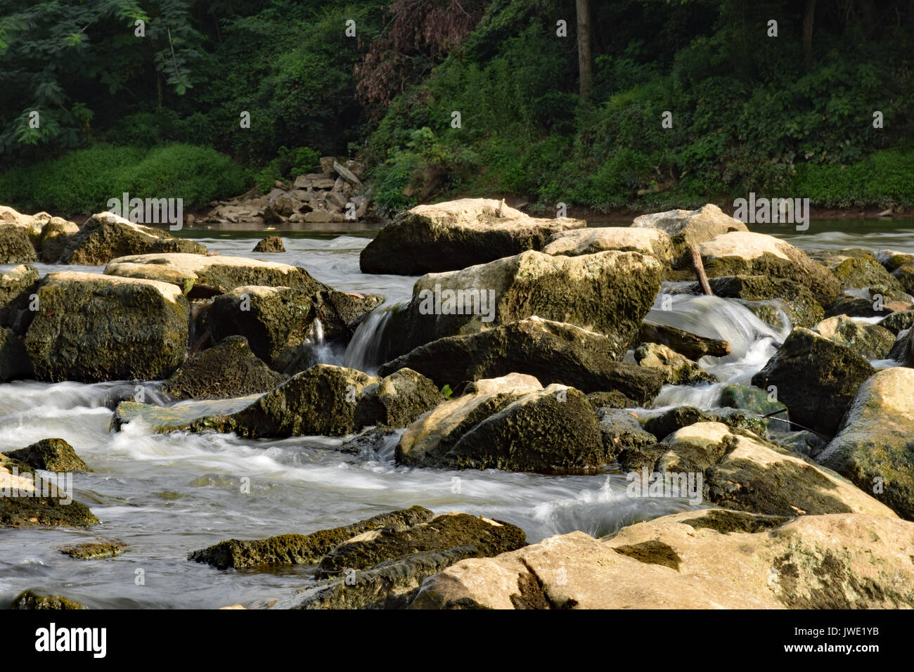River Flowing Over Rocks Stock Photo - Alamy