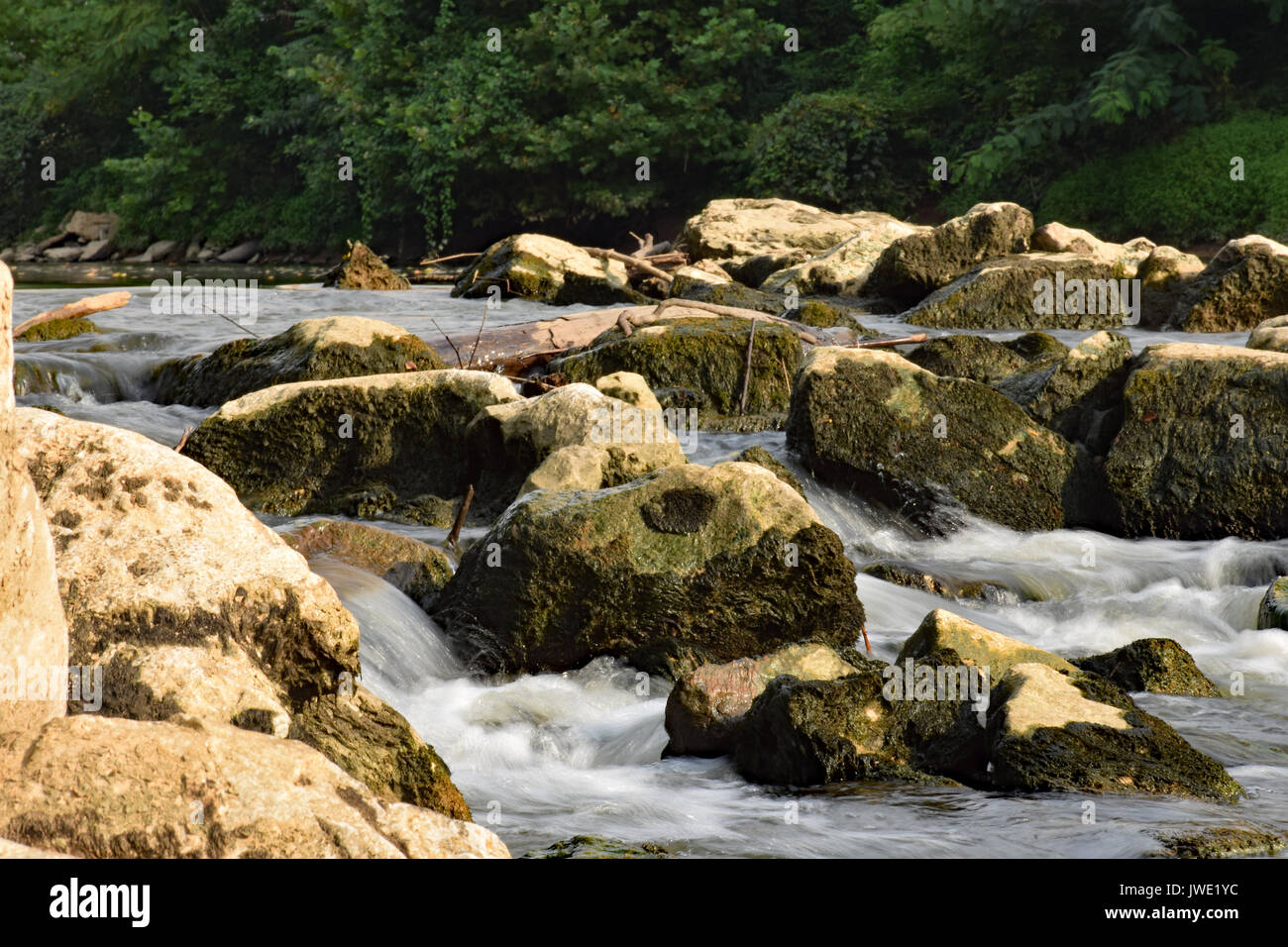 River Flowing Over Rocks Stock Photo - Alamy