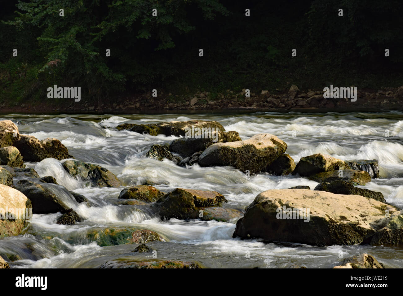 River Flowing Over Rocks Stock Photo - Alamy