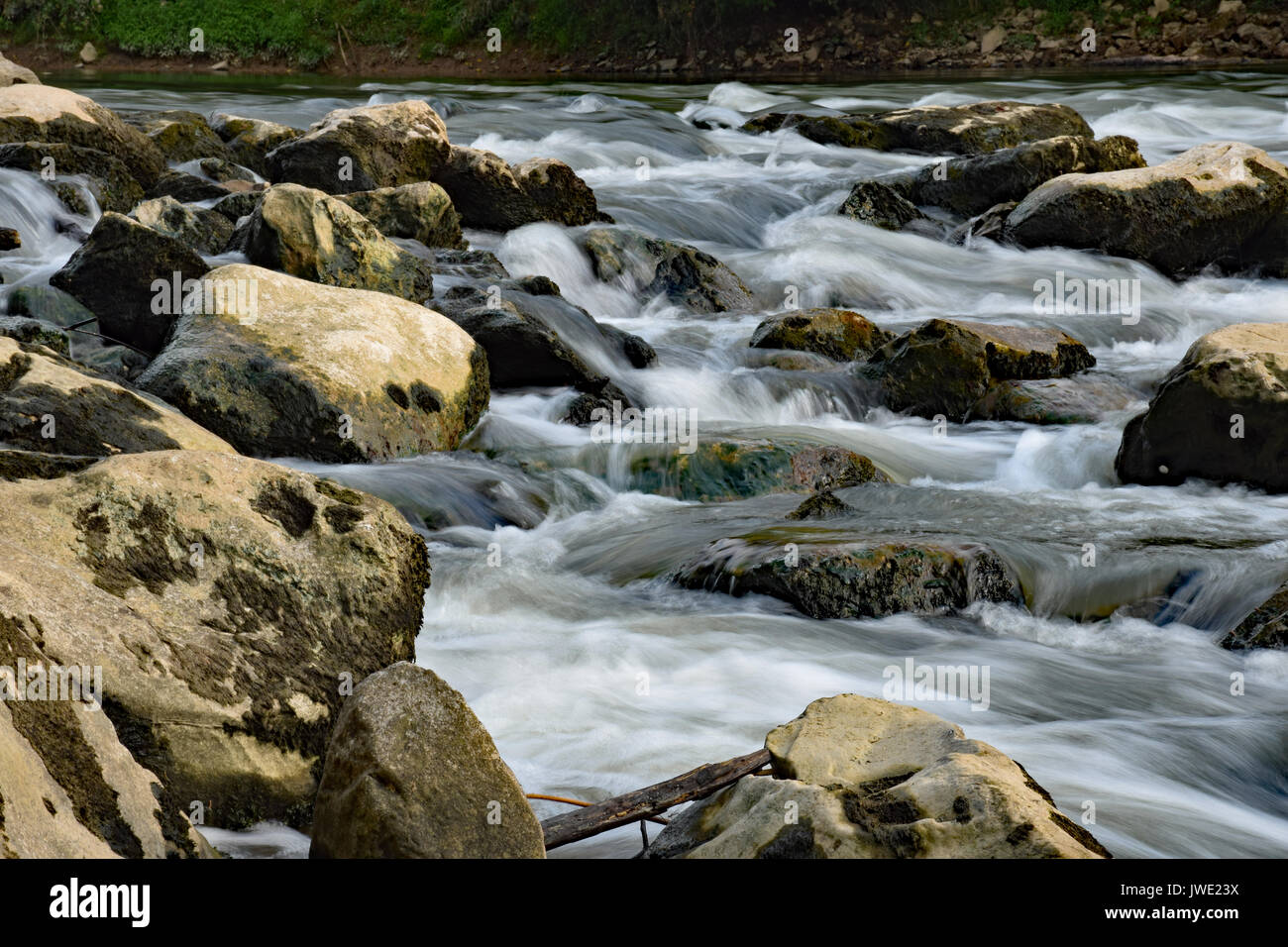 River Flowing Over Rocks Stock Photo - Alamy