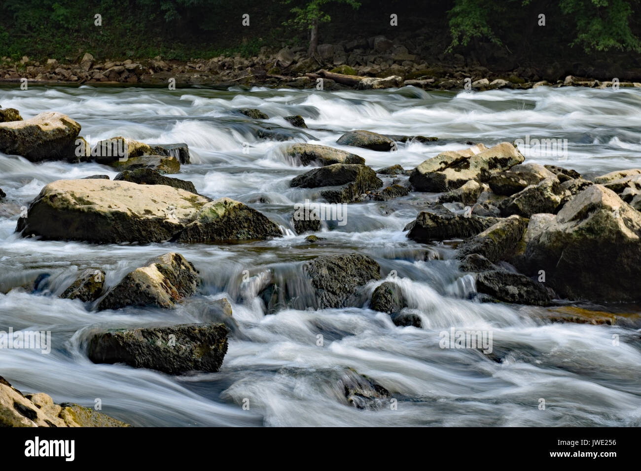 River Flowing Over Rocks Stock Photo - Alamy