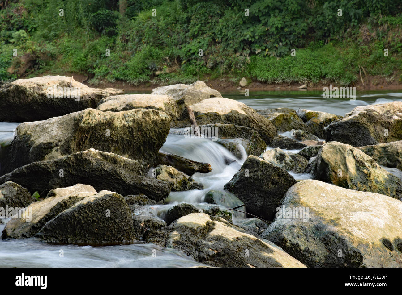 River Flowing Over Rocks Stock Photo - Alamy