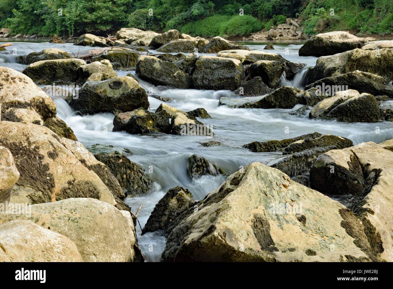 River Flowing Over Rocks Stock Photo - Alamy