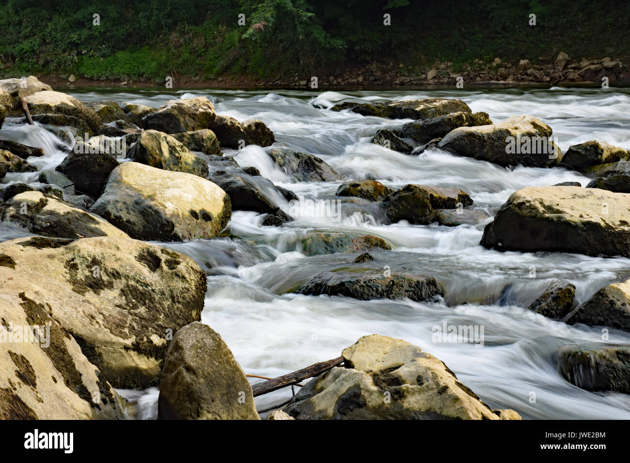 River Flowing Over Rocks Stock Photo - Alamy