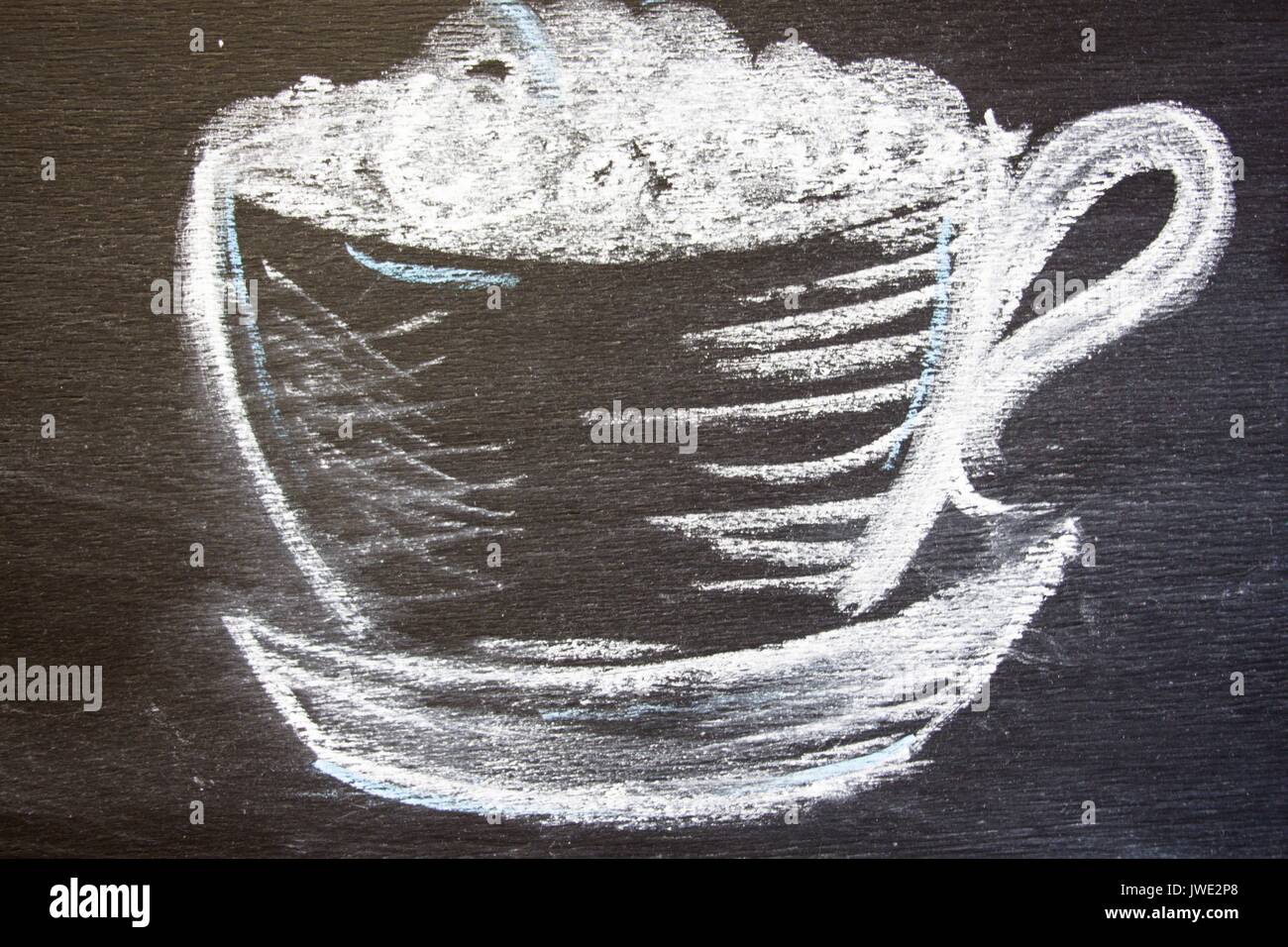 A cup of coffee is drawn chalk on a black board Stock Photo - Alamy