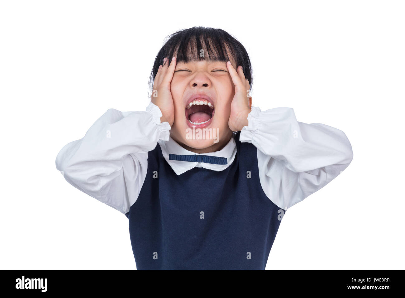 Asian Little Chinese Girl screaming with hands on her face in isolated ...