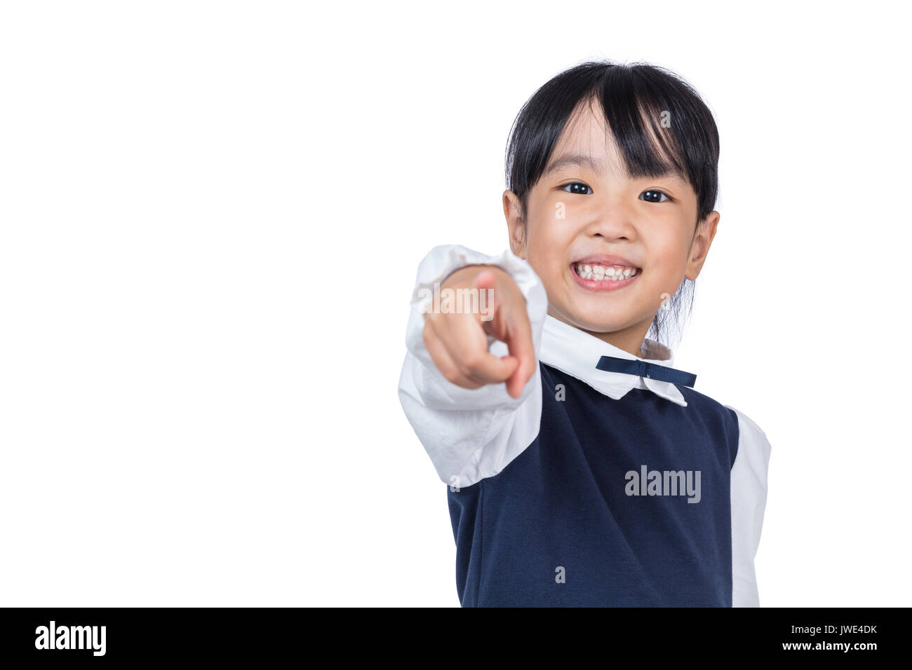 Asian Little Chinese Girl pointing with finger in isolated White ...