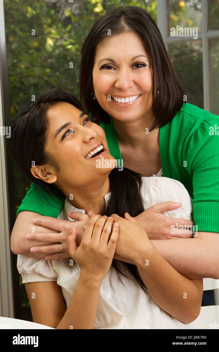 Hispanic mother and daughter Stock Photo - Alamy