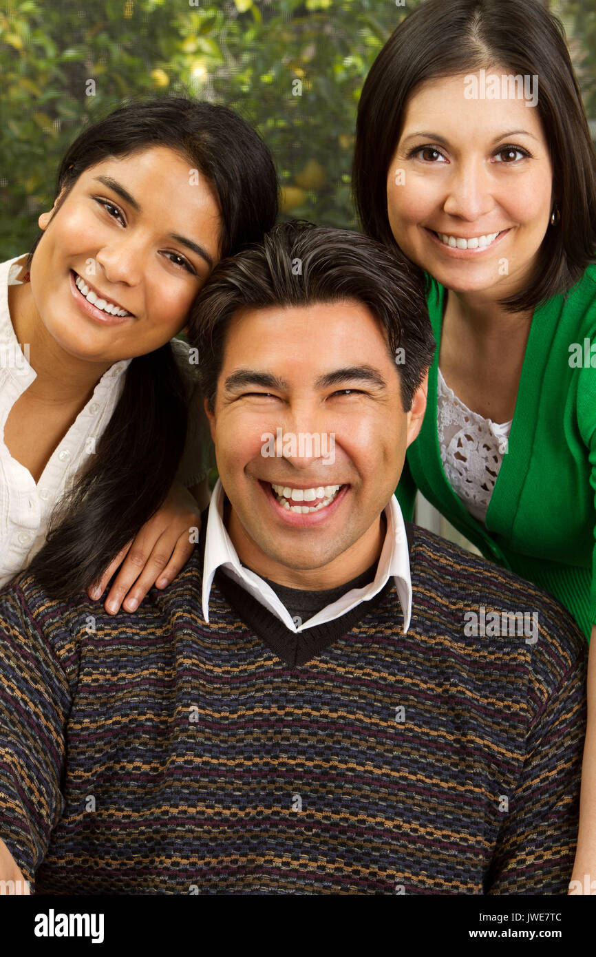 Hispanic family with a teen daughter Stock Photo - Alamy