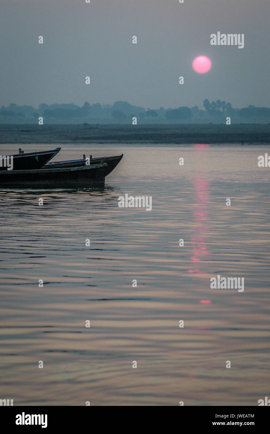 Boats at sunrise Stock Photo - Alamy