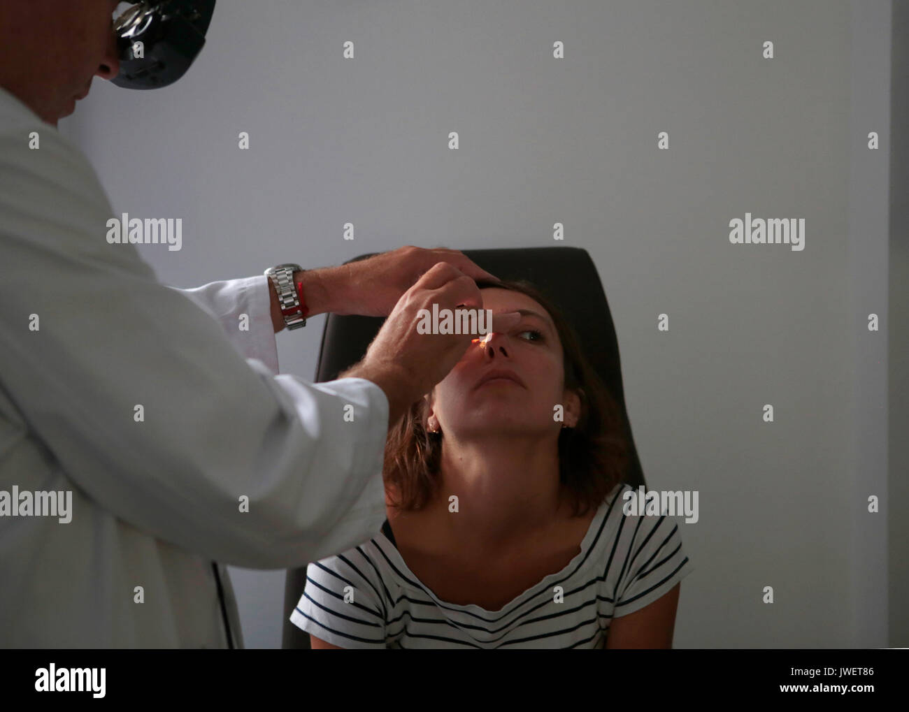 Doctor Checking Eyes High Resolution Stock Photography and Images - Alamy