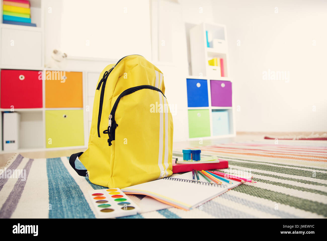 Colourful children rooom with white walls and furniture Stock Photo - Alamy