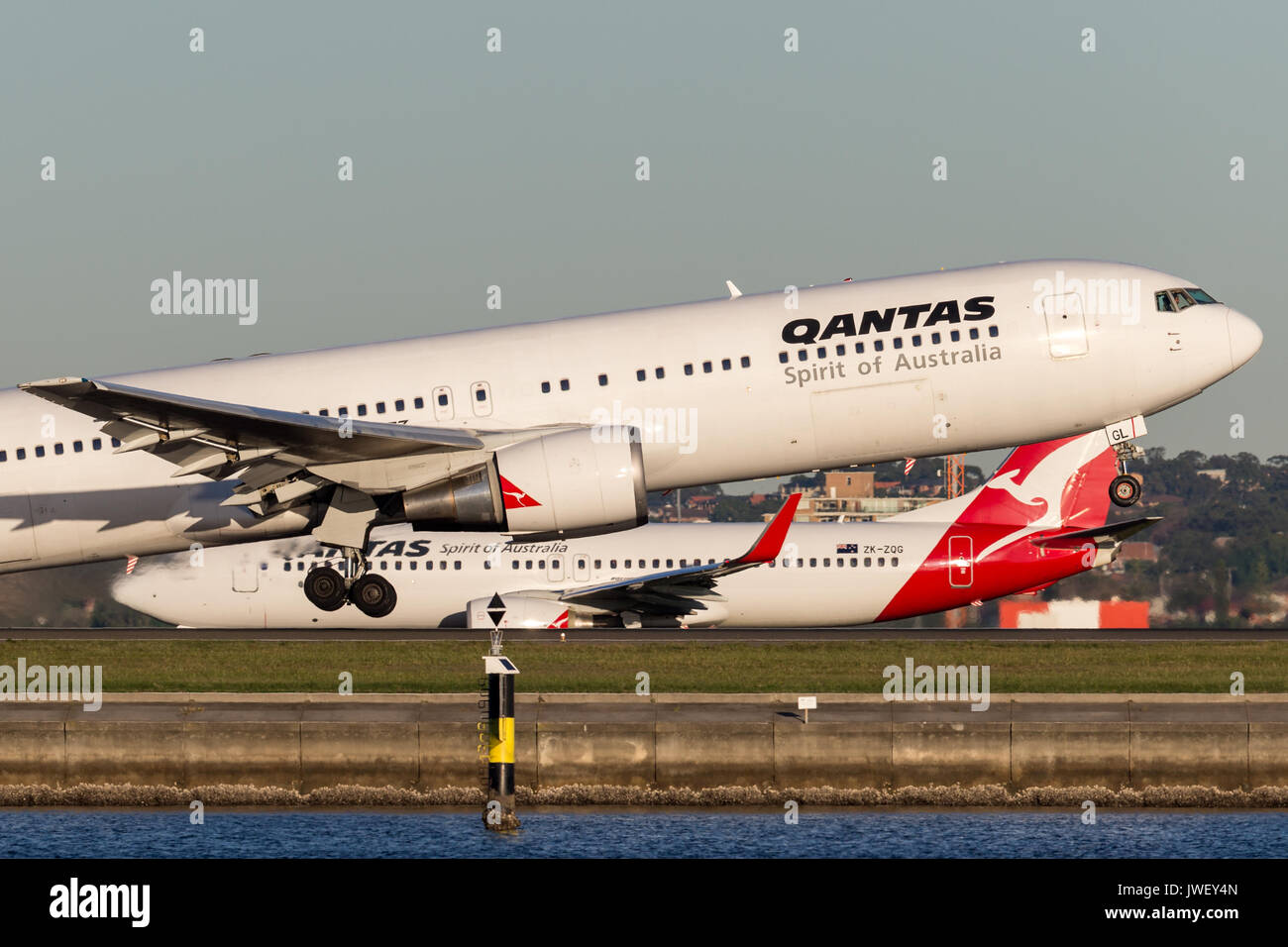 Qantas Boeing 767 airliner taking off from Sydney Airport Stock Photo ...