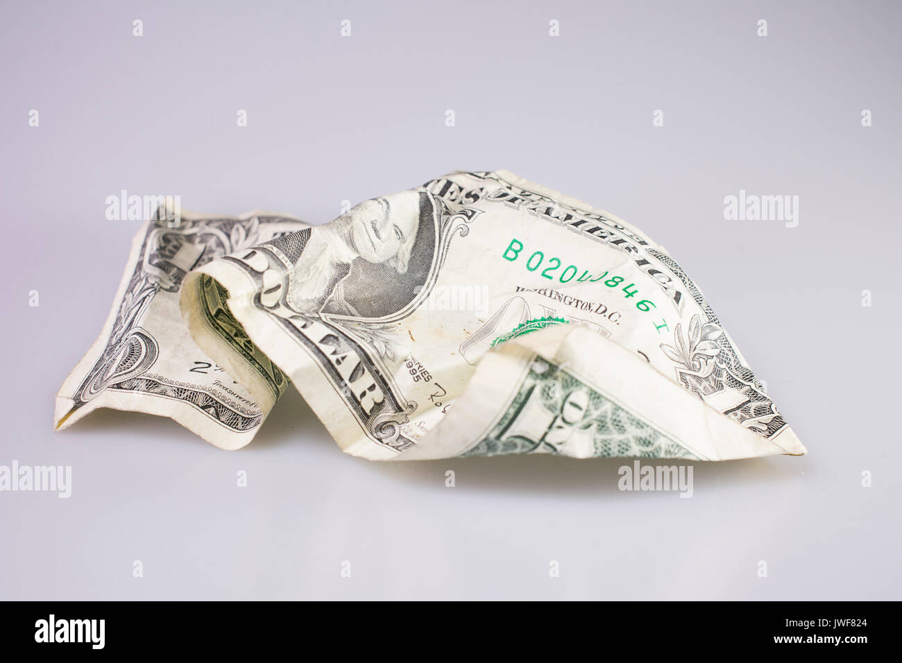 Scrunched up one dollar note hi-res stock photography and images - Alamy