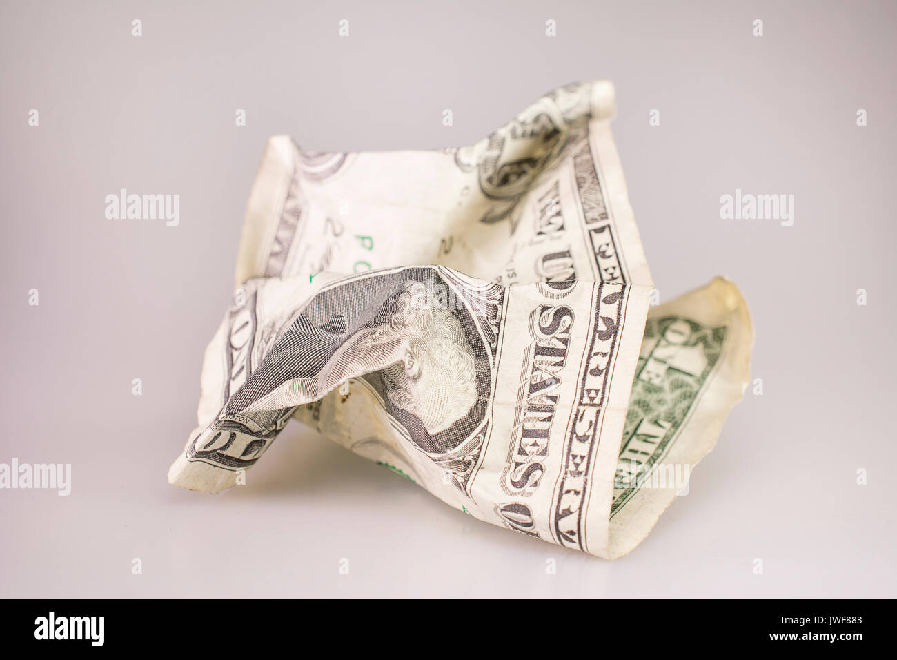 Scrunched up one dollar note hi-res stock photography and images - Alamy