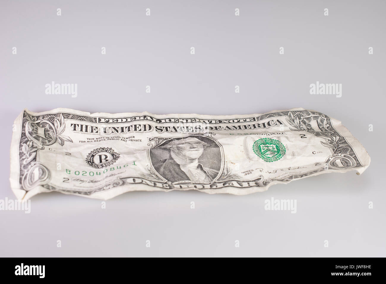 Scrunched up one dollar note hi-res stock photography and images - Alamy