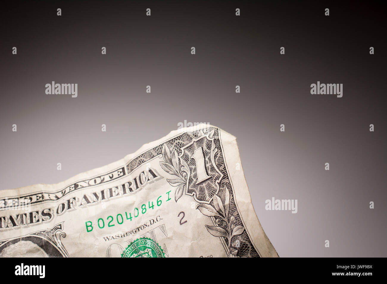 Scrunched up one dollar note hi-res stock photography and images - Alamy