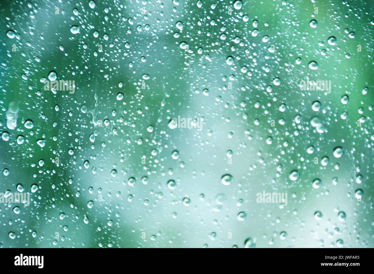 abstract drop water with greenbackground Stock Photo - Alamy