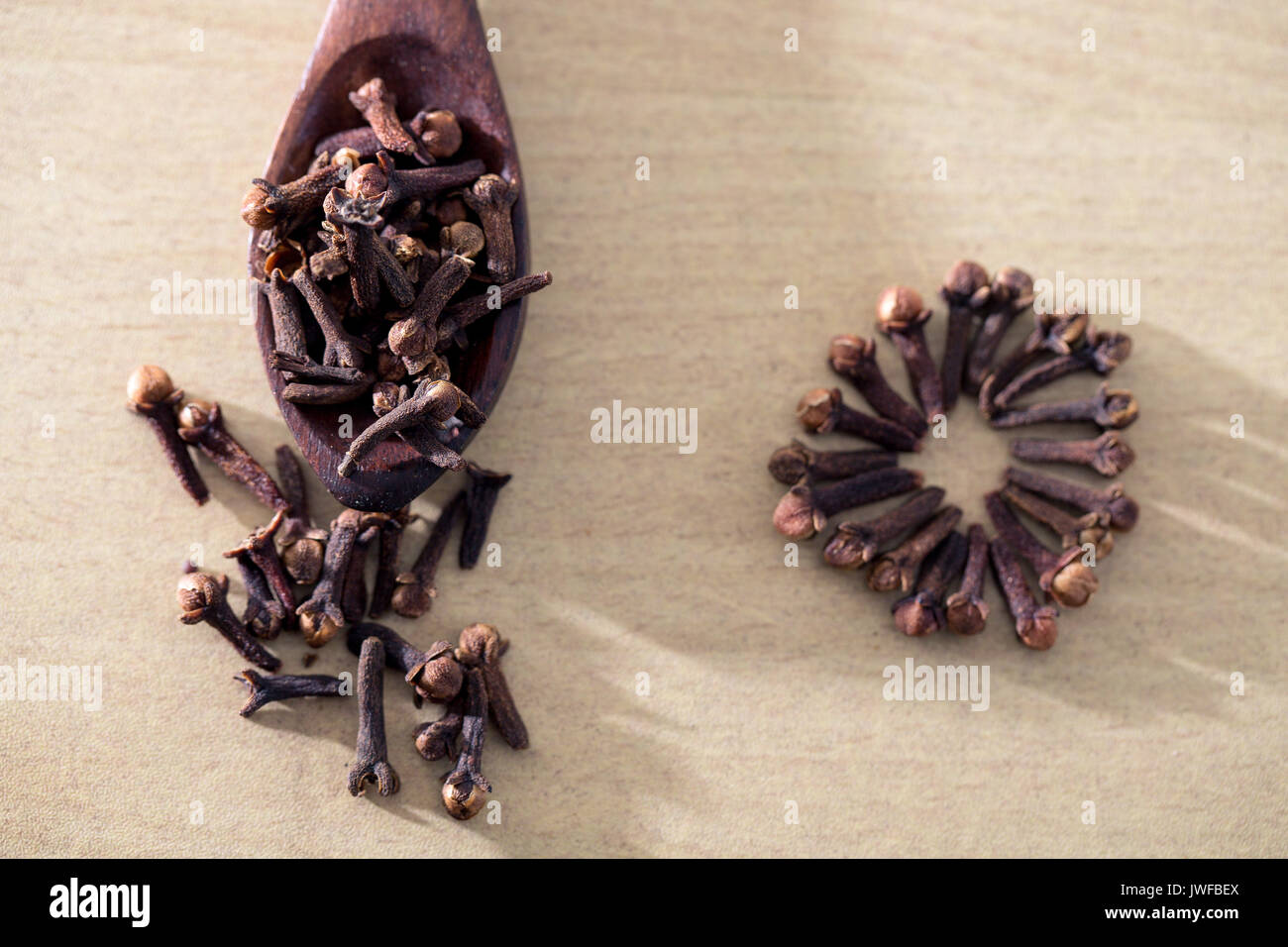 clove placed on light background Stock Photo - Alamy