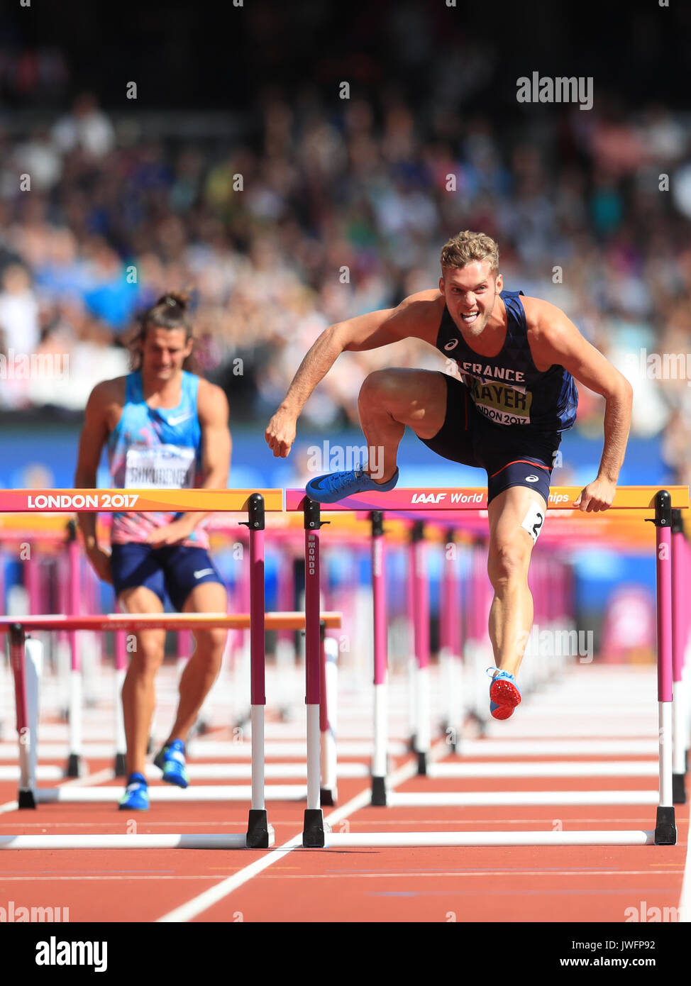 France's Kevin Mayer (right) jumps a hurdle as Authorised Neutral ...