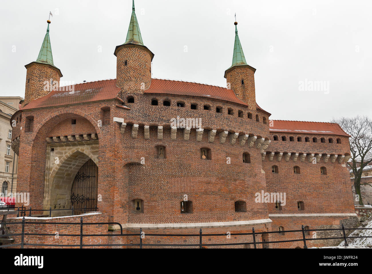 Military medieval building Barbican at winter in Krakow, Poland Stock ...