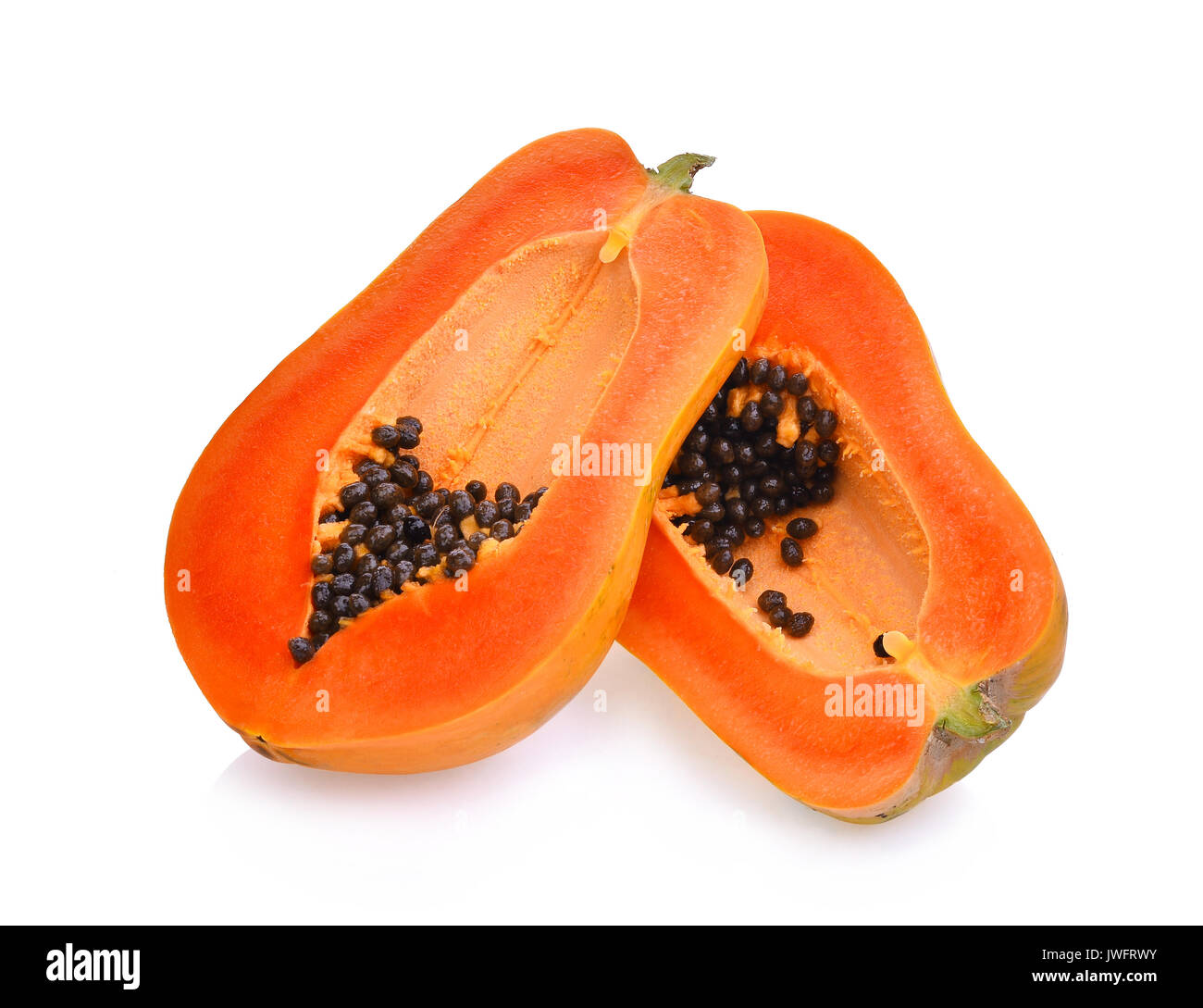 half of fresh papaya isolated on white background Stock Photo - Alamy