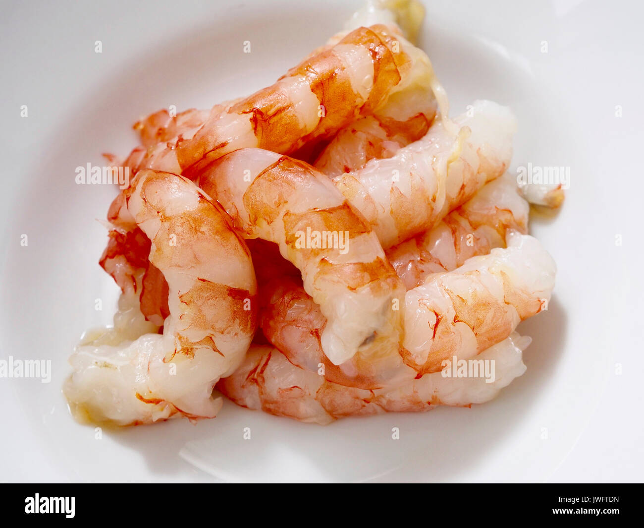 Raw peeled prawn Stock Photo - Alamy