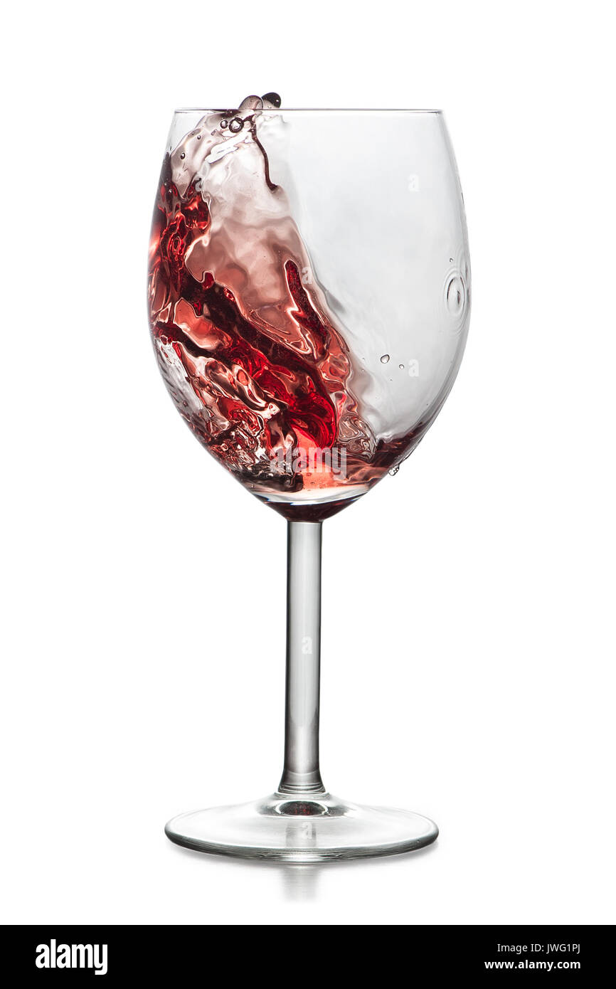 Moving red wine glass over a white background Stock Photo - Alamy
