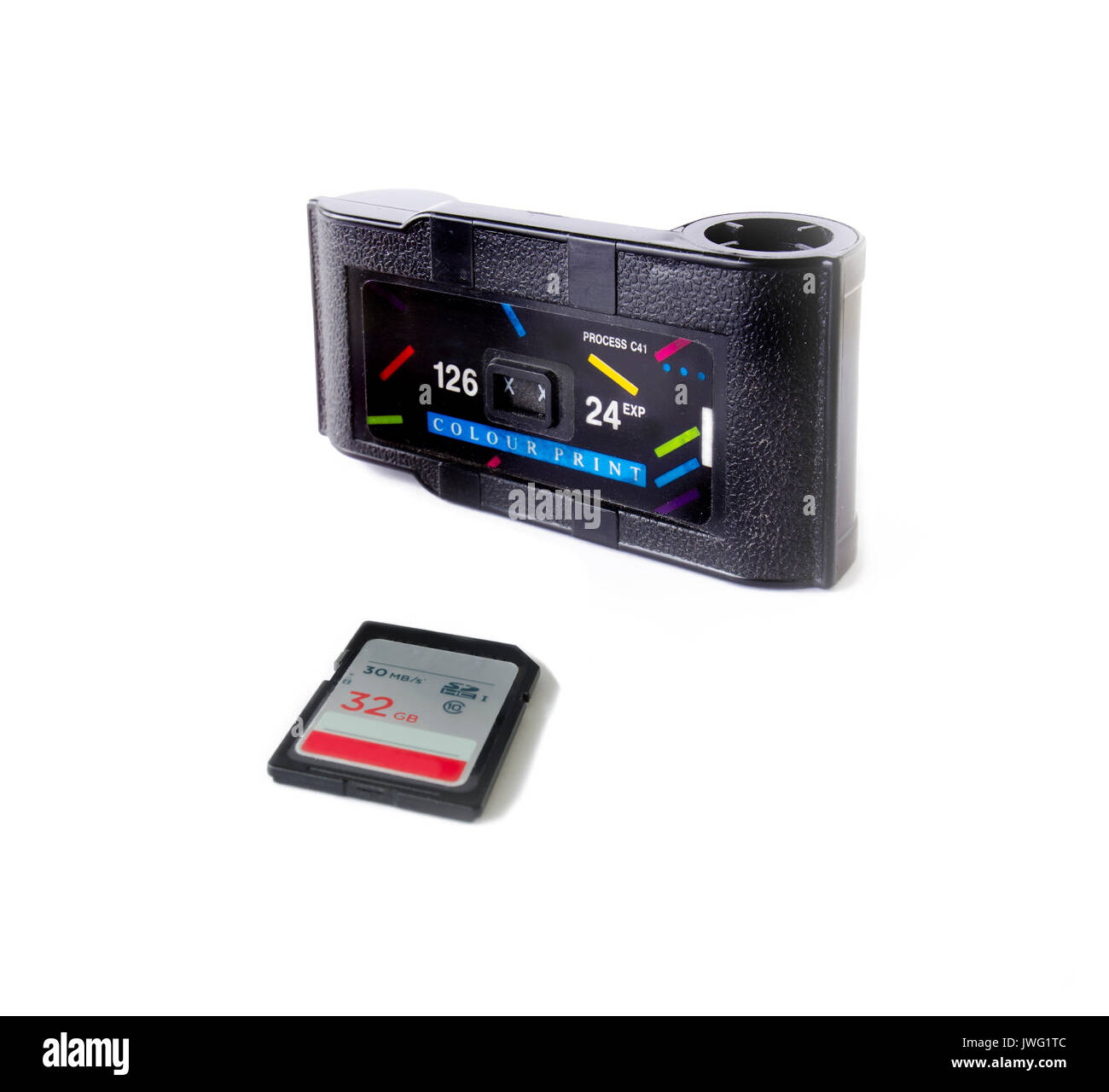 Old 126 film cartridge and sd card isolated on a white background Stock ...