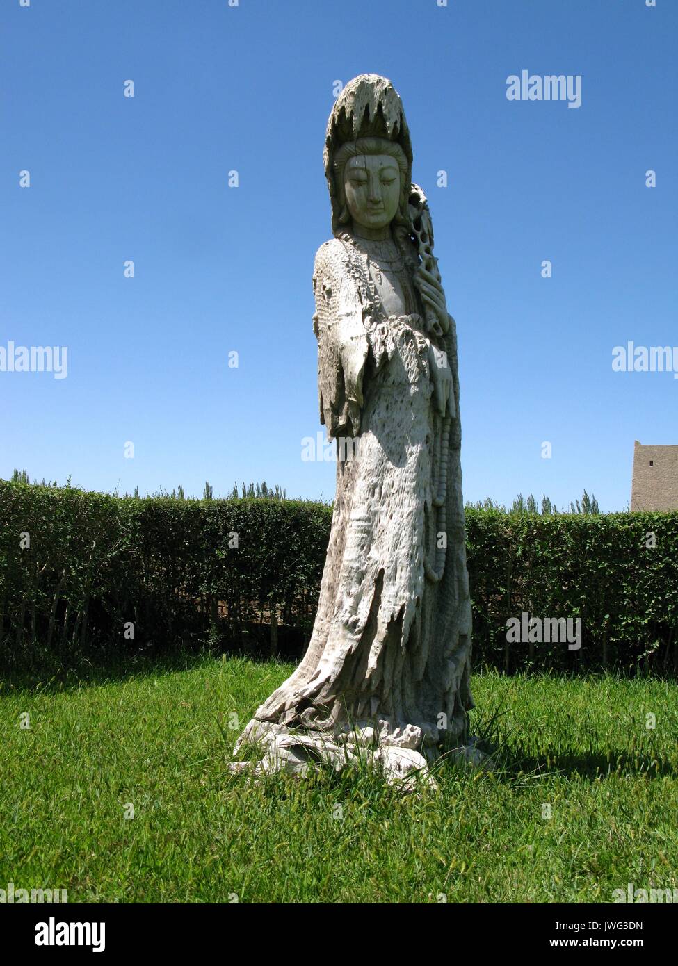Guan Yin statue - the goddess of mercy Stock Photo - Alamy