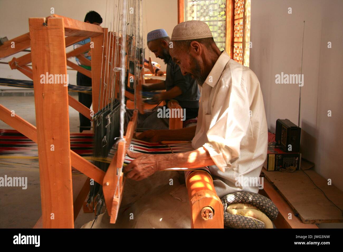 Hotan atlas silk factory hi-res stock photography and images - Alamy