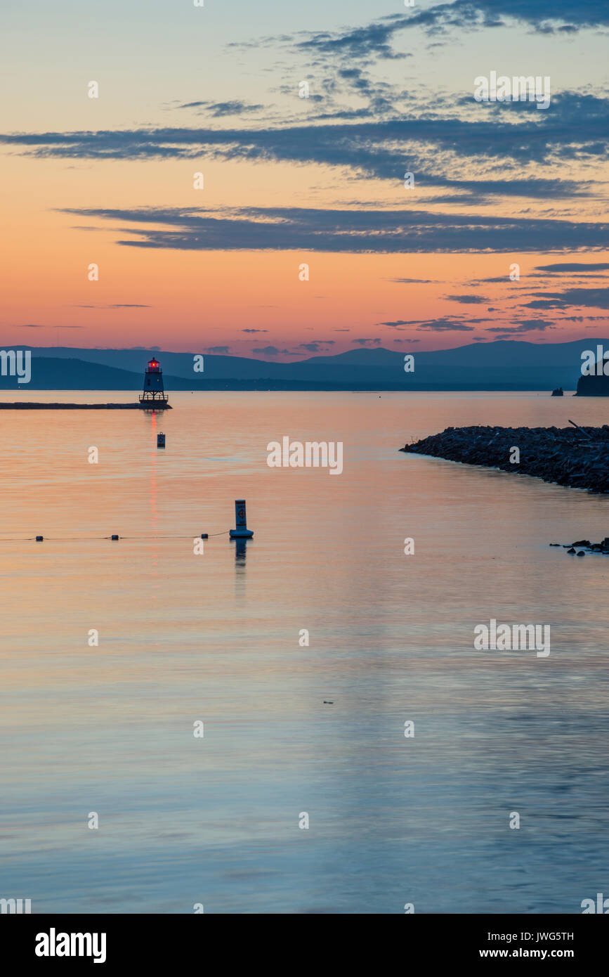 Colorful dusk, sunset shot of the lighthouse on Lake Champlain with ...