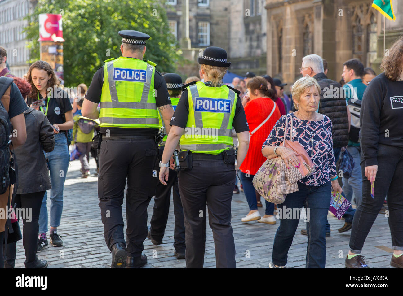 Police Officers on foot patrolling the Edinburgh Festival Fringe on the ...
