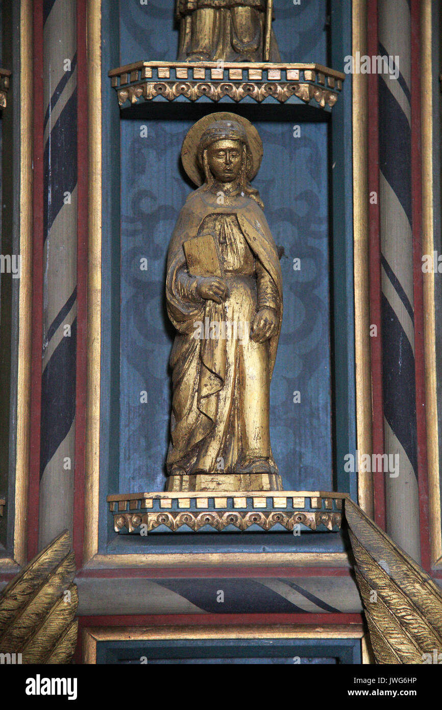 Gilt reredos of saints inside church of Saint Mary, Swilland, Suffolk ...