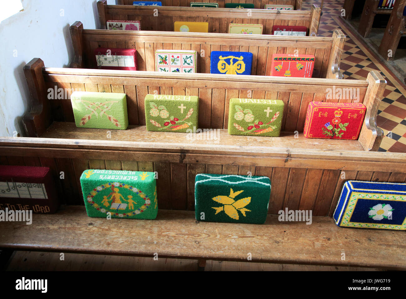 Knitted kneelers on pews, Church of Saint Gregory, Hemingstone, Suffolk ...