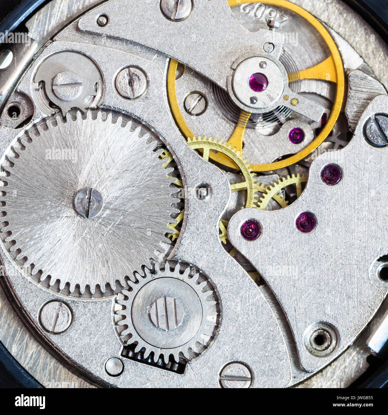 watchmaker workshop - steel clockwork of old mechanical wristwatch ...